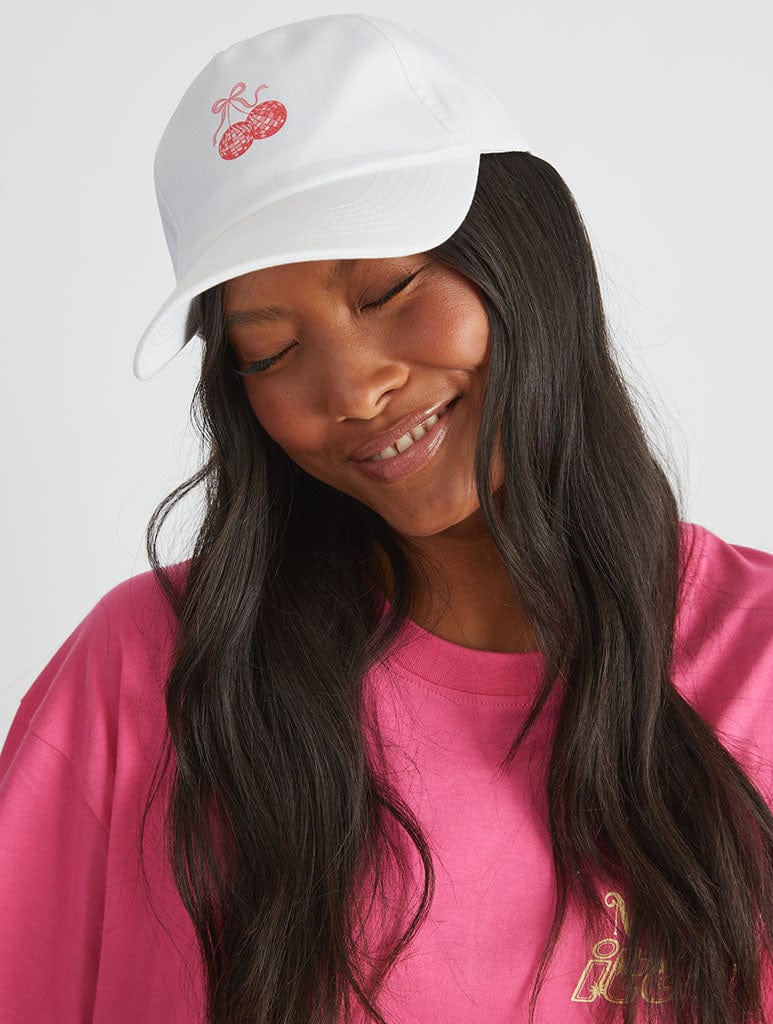 Bow Disco Cherry Cap in White | Aesthetic Baseball Caps | Skinnydip London