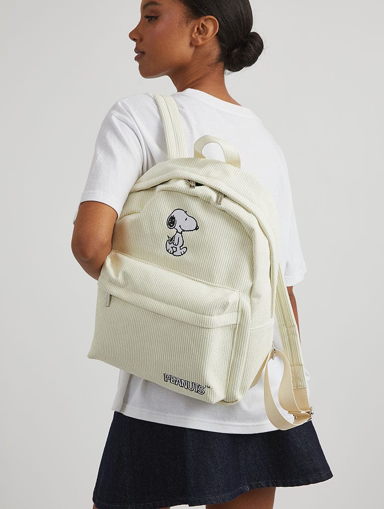 Peanuts x Skinnydip Snoopy Cord Backpack | Cream Backpacks | Skinnydip ...